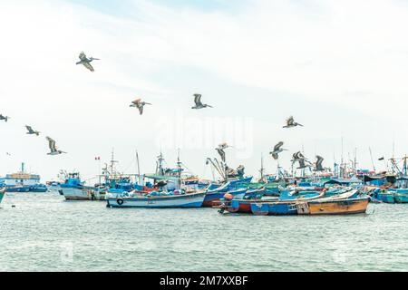 Peru - September 21, 2022: fishing boats in the ocean Stock Photo - Alamy