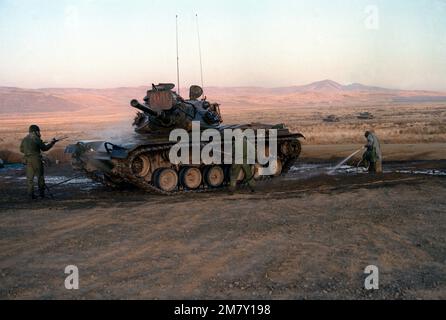 Members of the 9th Chemical Company, 9th Infantry Division, wash down ...