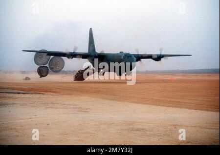 A Low Altitude Parachute Extraction System (LAPES) drop takes place ...