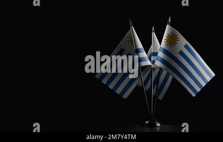 Small national flag of the Uruguay on a black background Stock Photo ...
