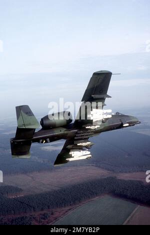 An air-to-air right underside view of an A-10 Thunderbolt II aircraft ...