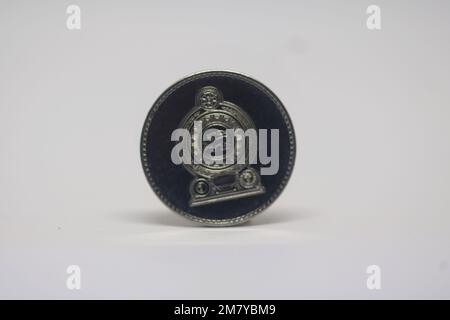 A front view of a Sri Lankan 10 rupee coin isolated on white background ...