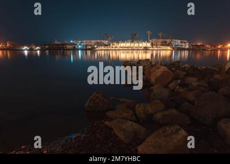 A beautiful long exposure of El Gouna lagoon with a view of a hotel at ...