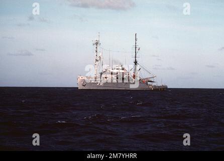 A port bow view of the salvage ship USS RECLAIMER (ARS-42) as it heads ...