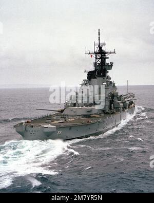 An aerial starboard quarter view of the battleship USS NEW JERSEY (BB ...