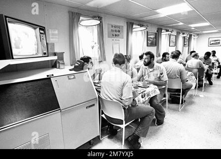 Crewman eat launch in the enlisted dining facility aboard the oiler USS ...