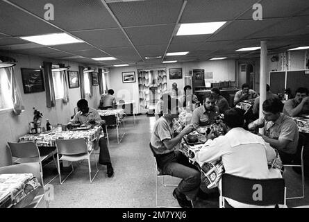 Crewman eat launch in the enlisted dining facility aboard the oiler USS ...