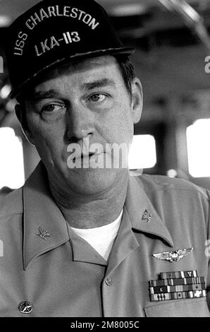 A view of CAPT Ward L. West, commanding officer of the amphibious cargo ...