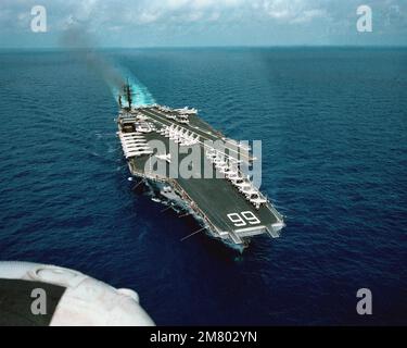 An aerial starboard bow view of the aircraft carrier USS CONSTELLATION ...