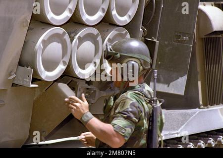 A member of the 3rd Bn., 6th Field Arty., 1ST Infantry Div., prepares a ...