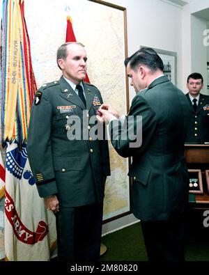 A promotion ceremony is held at Arlington National Cemetery on May 19 ...