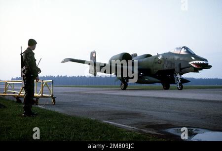A right front view of an A-10 Thunderbolt II aircraft on the runway ...