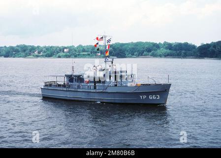 Starboard bow view of a Yard Patrol Craft YP 690 tied up at its ...