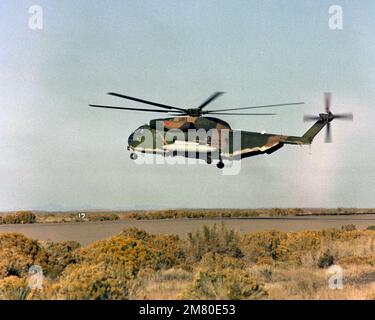 A left side view of an H-53 helicopter on the helipad at the Utah Test ...
