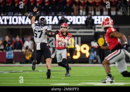 TCU linebacker Johnny Hodges (57) tackles Texas running back Bijan ...