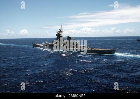 Aerial port quarter view of the battleship USS NEW JERSEY (BB 62 ...