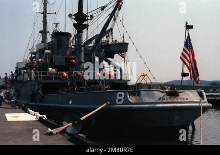 A port quarter view of the salvage ship USS BOLSTER (ARS 38), preparing ...