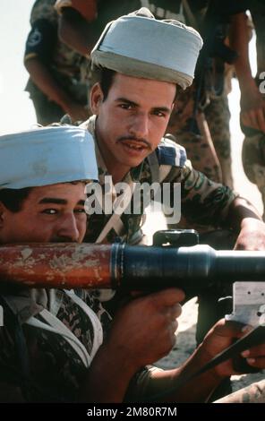 A Soviet RPG-7 portable rocket launcher in firing position. Country ...