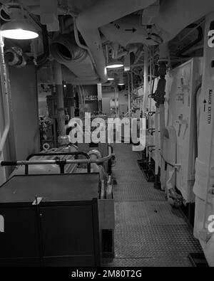 The lower level engine room aboard the guided missile frigate UNDERWOOD ...