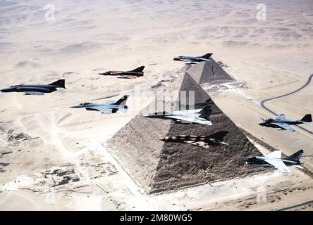 An air-to-air left side view of a multinational variable-swept-winged ...