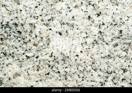 Close up of a piece of granite, a coarse-grained, igneous rock composed ...