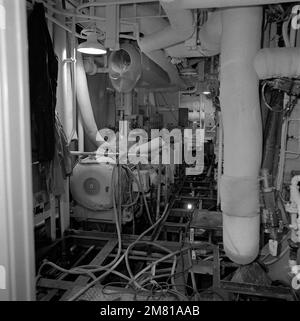 The lower level engine room aboard the guided missile frigate UNDERWOOD ...