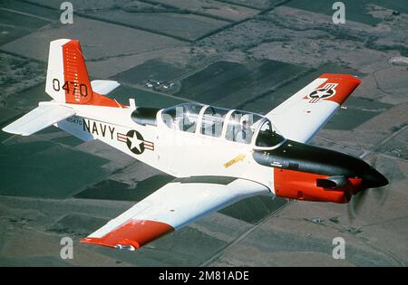 A right side view of a T-34C Mentor trainer aircraft parked on the ...