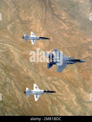 Air-to-air overhead view of an T-38 Talon aircraft in flight. Base ...