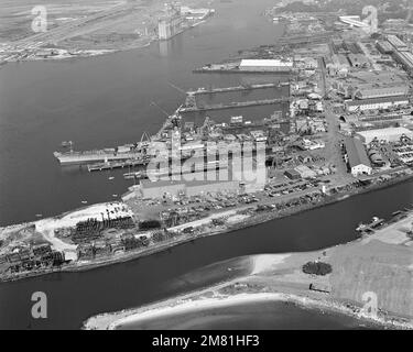 An elevated port beam view of the battleship USS IOWA (BB 61) underway during sea trials ...