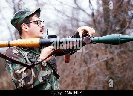 A Soviet RPG-7 portable rocket launcher in firing position. Country ...