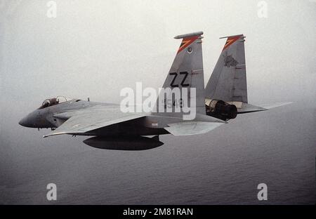 An air-to-air left side view of 18th Tactical Fighter Wing F-15 Eagle ...