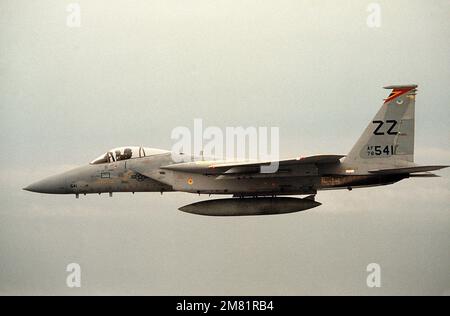 An air-to-air left side view of 18th Tactical Fighter Wing F-15 Eagle ...