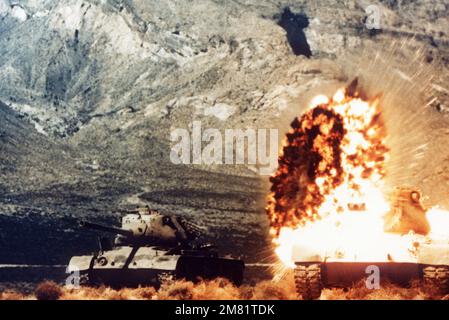 An M712 Copperhead cannon-launched laser-guided projectile is fired ...