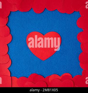 Hearts of paper on red textured background. San Valentine day concept ...