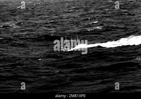 An aerial port side view of a Soviet "Victor I" class submarine ...
