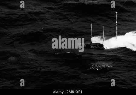An aerial port side view of a Soviet "Victor I" class submarine ...