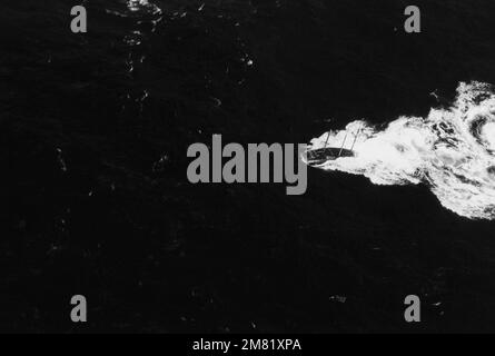 An aerial view of a Soviet "Victor I" class submarine submerged just ...