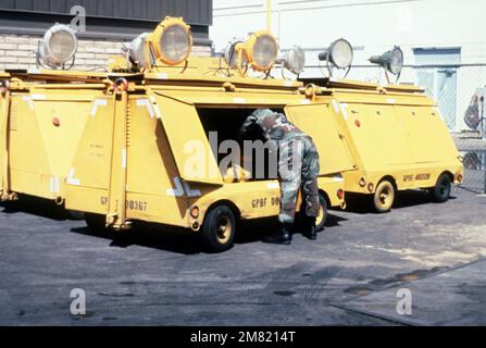 A member of the Aircraft Intermediate Maintenance Department (AIMD ...