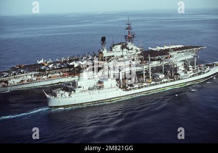 USS Hassayampa (AO-145) refueling USS Hancock (CVA-19) and USS McKean ...