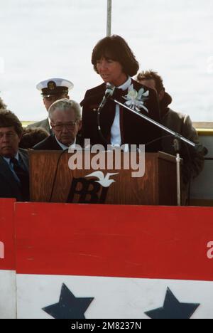 Mrs. Edward G. Waller III, sponsor, christens the Safeguard class ...