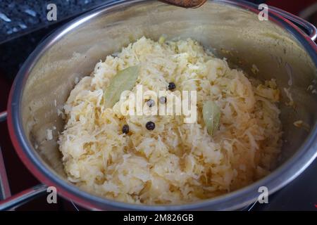 Swabian cuisine, cooking sauerkraut, preparing Krautkrapfen, flour ...