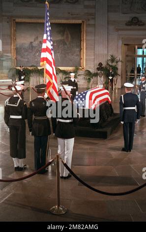 A joint services honor guard stands by next to the presidential ...