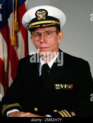 Official portrait, covered, of Commander, Fleet Activities Okinawa ...