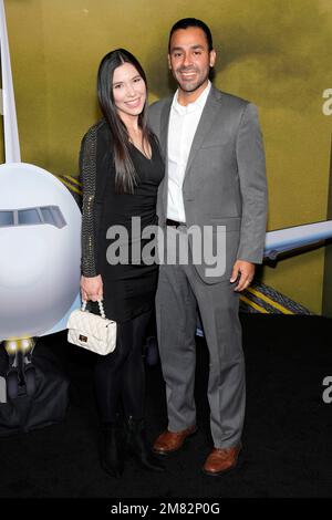 Rose Eshay and Ricky Robles Cruz attend the "Plane" New York premiere ...