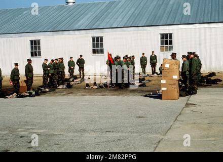Marine recruits stand in ranks outside their barracks, as a personnel ...
