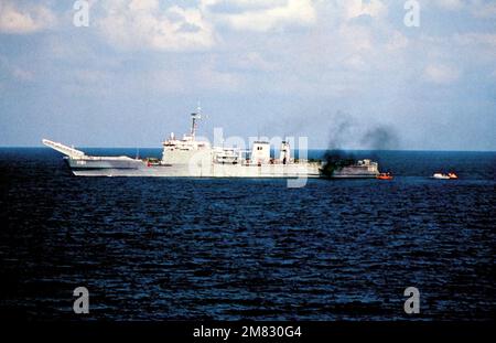 A port side view of the sinking Panamanian ship "SKY ONE". The tank ...