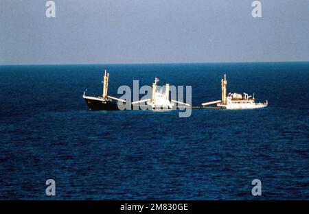 A port side view of the sinking Panamanian ship "SKY ONE". The tank ...