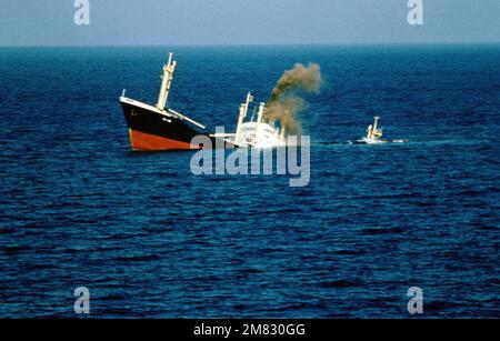 A port side view of the sinking Panamanian ship "SKY ONE". The tank ...