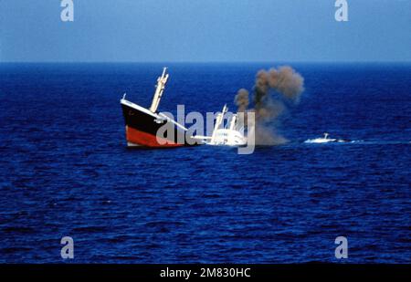 A port side view of the sinking Panamanian ship "SKY ONE". The tank ...
