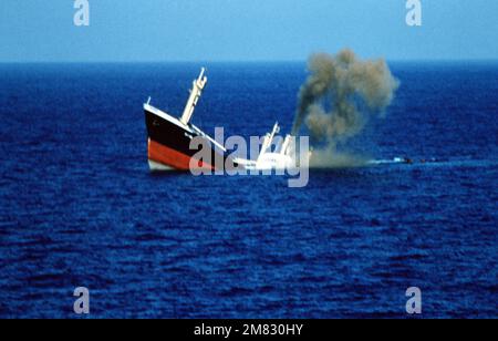 A port side view of the sinking Panamanian ship "SKY ONE". The tank ...